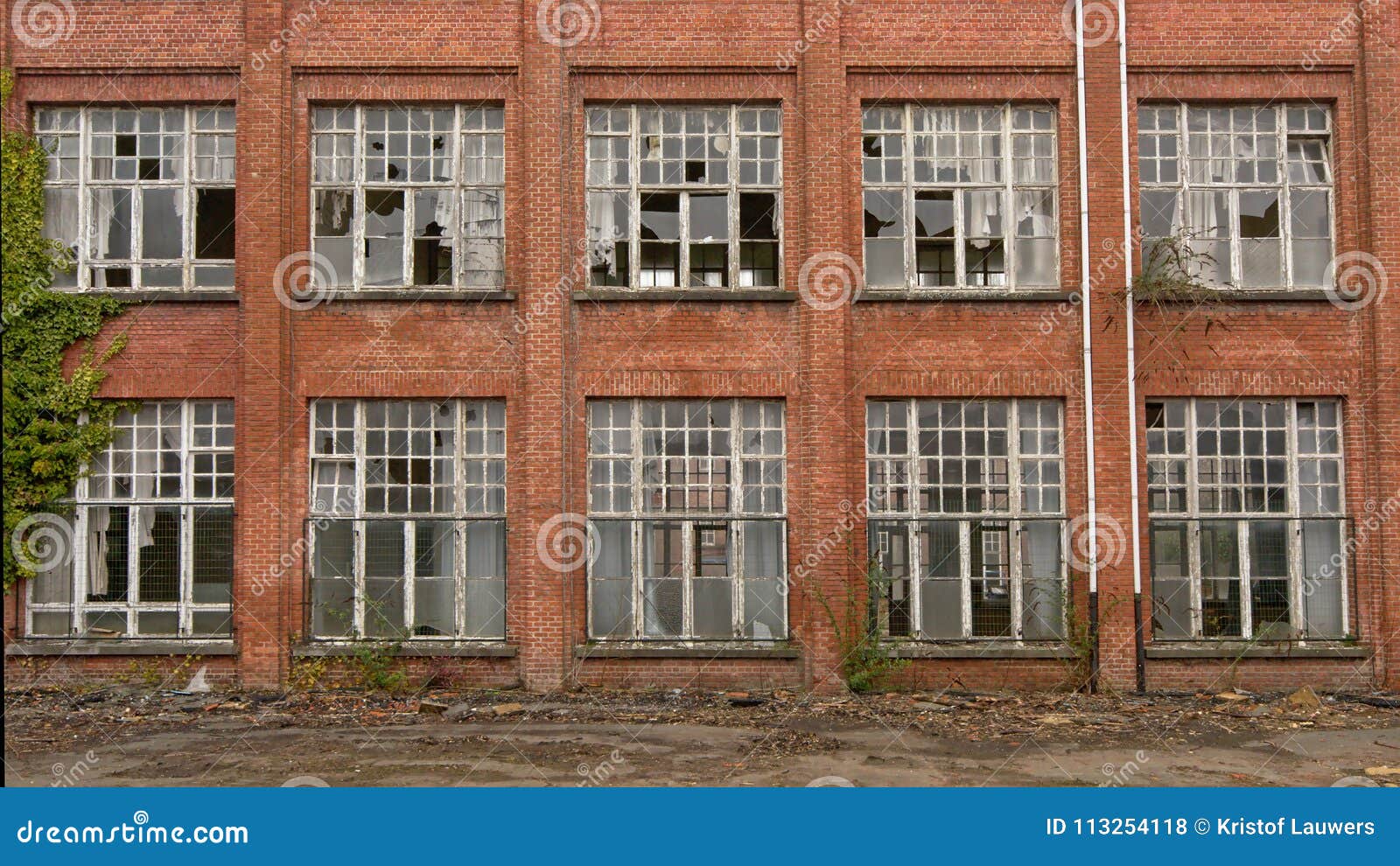 Brick Wall with Broken Windows of an Abandoned School Stock Photo ...