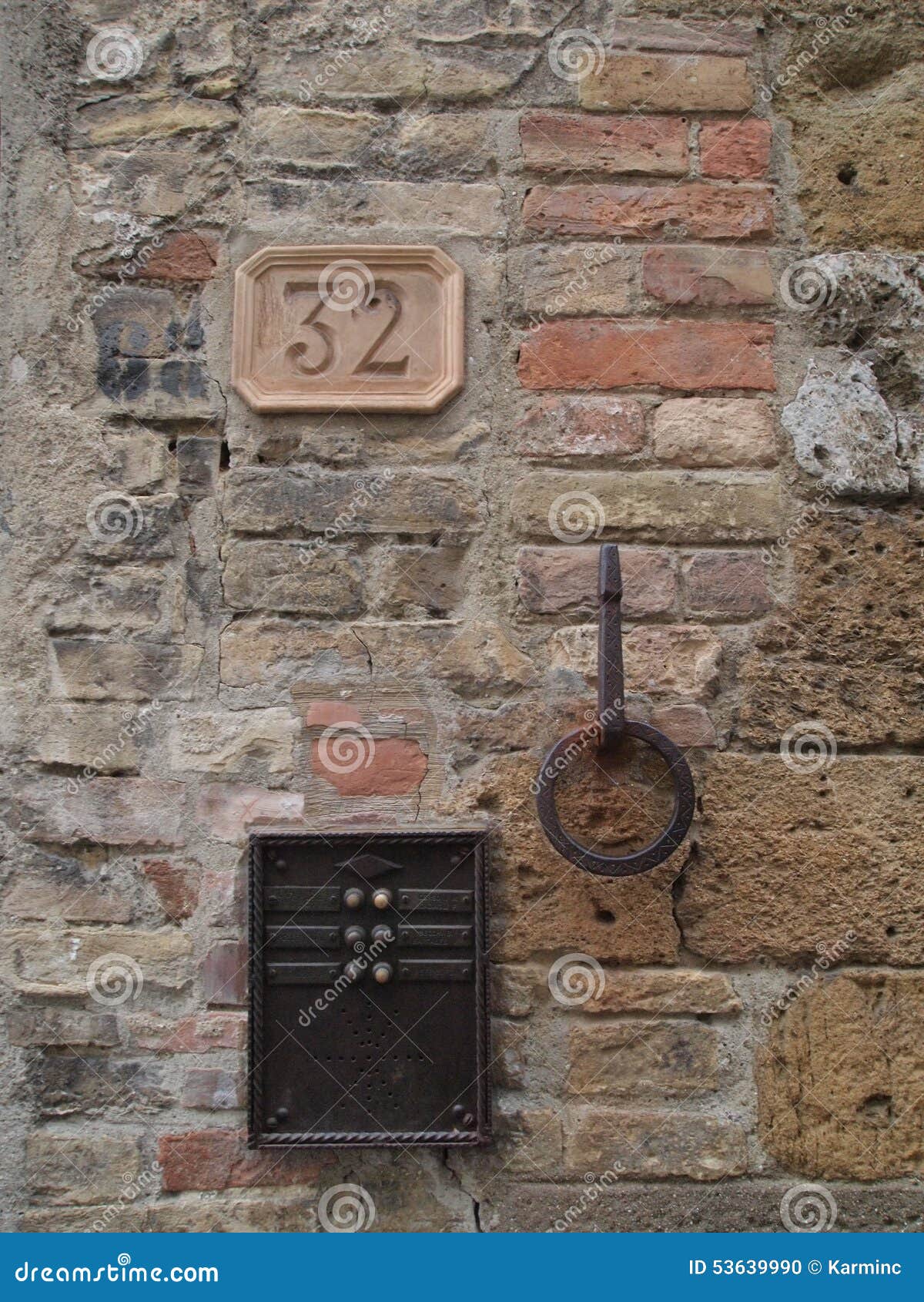 Brick Wall with Address and Nameplates Stock Photo - Image of wall ...