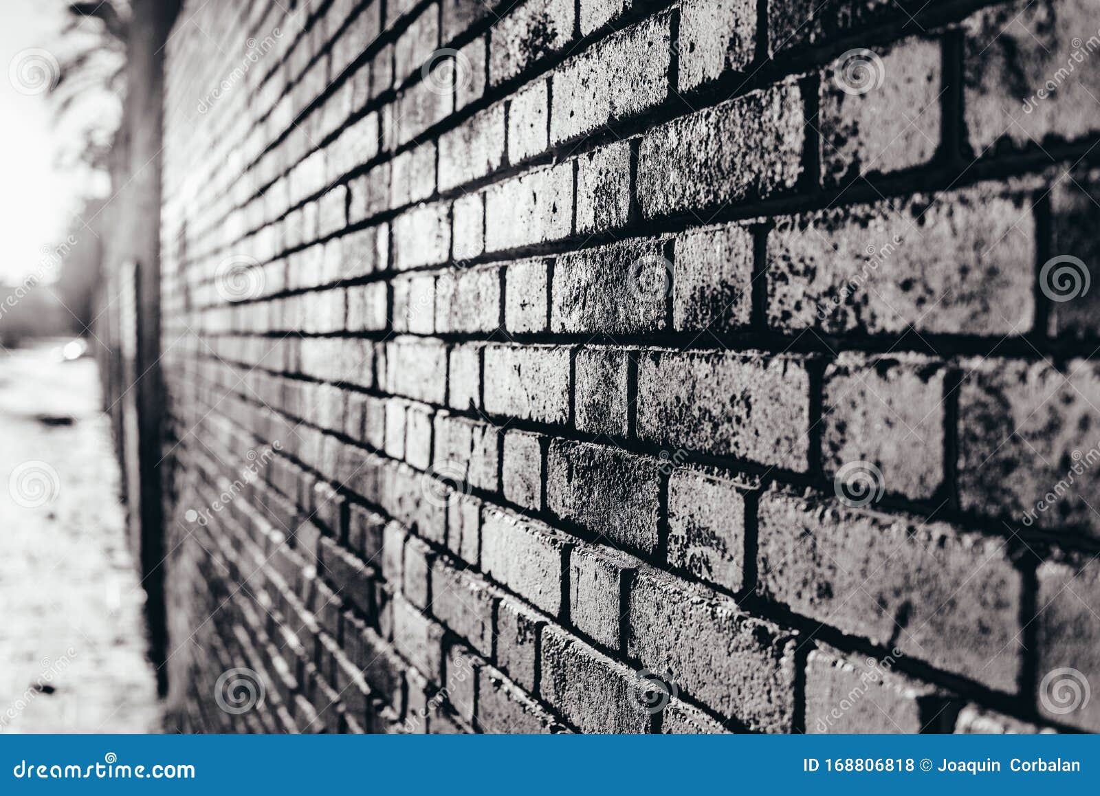 Brick Wall Background at Sunset with Sun Rays, Stone Texture Stock ...