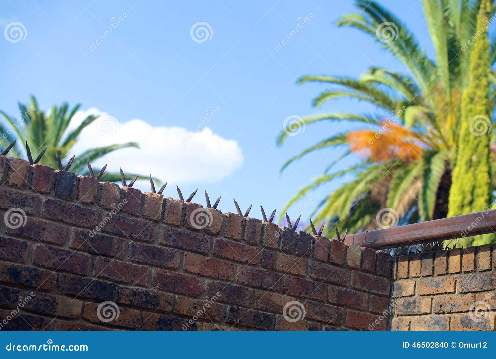 Brick wall with bar stock photo. Image of barbed, brick - 46502840