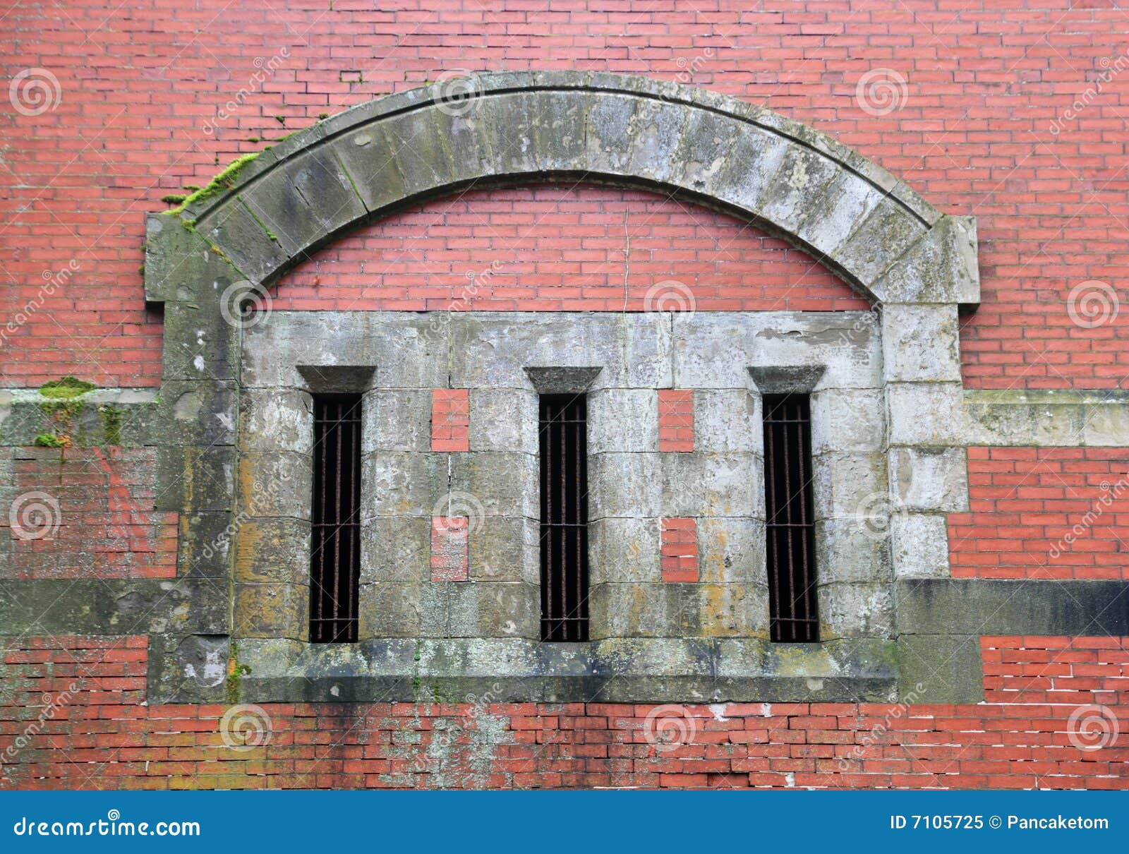 Brick Wall and Barred Windows Stock Image - Image of stone, mossy: 7105725