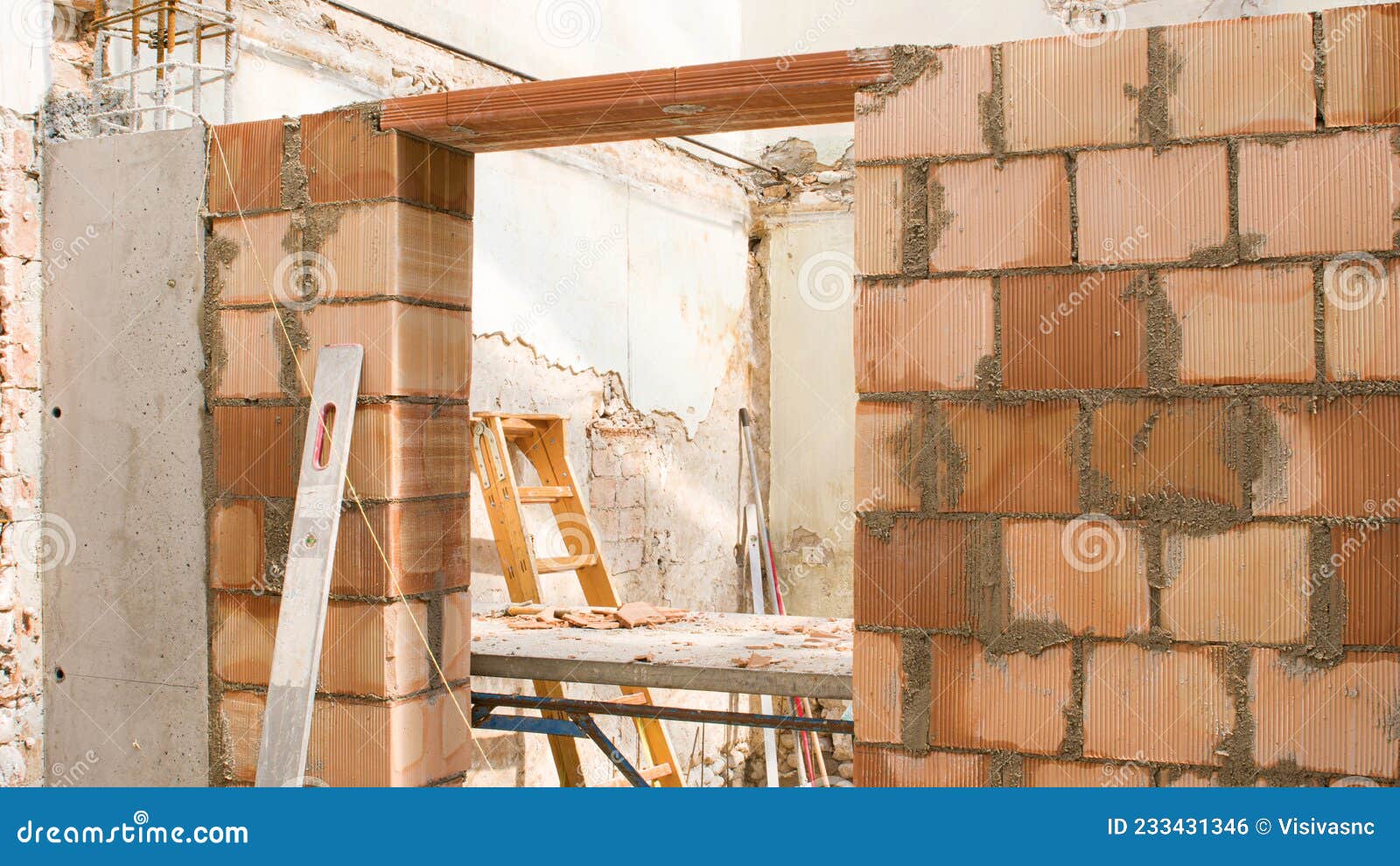 Brick Wall Of A Construction Site With A Ladder In The Background Stock ...