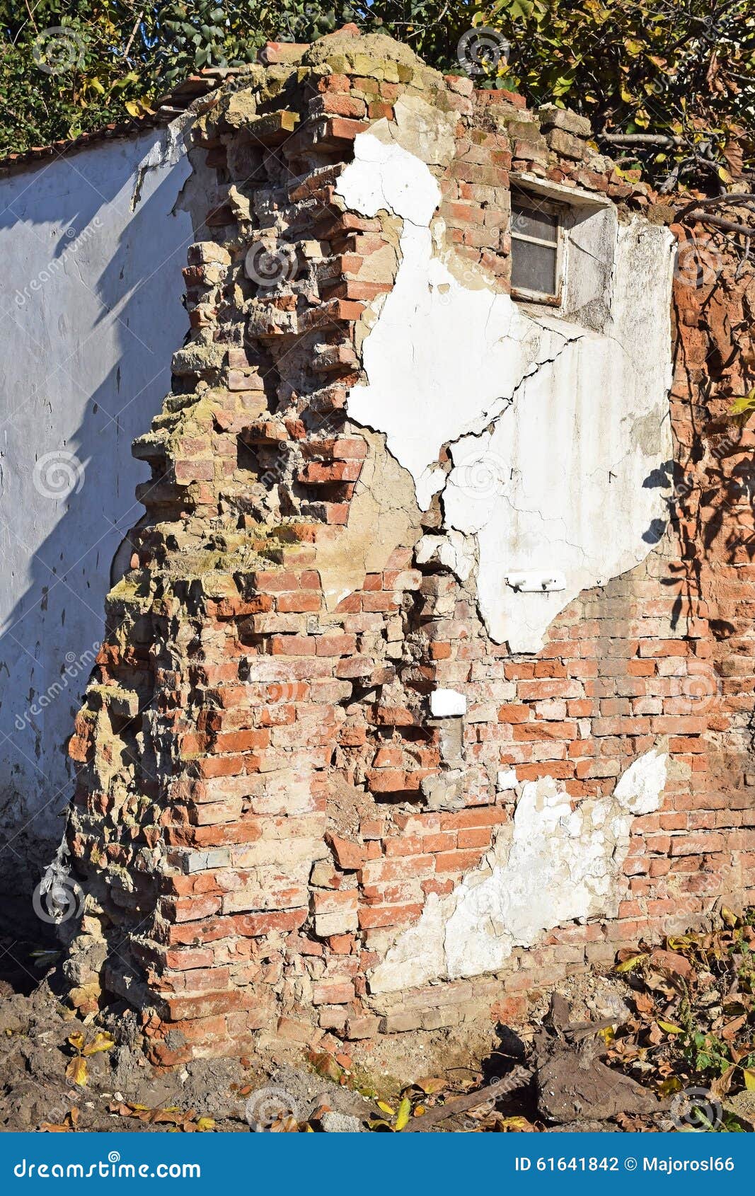 Brick Wall of a Demolished Building Stock Photo - Image of green, city ...