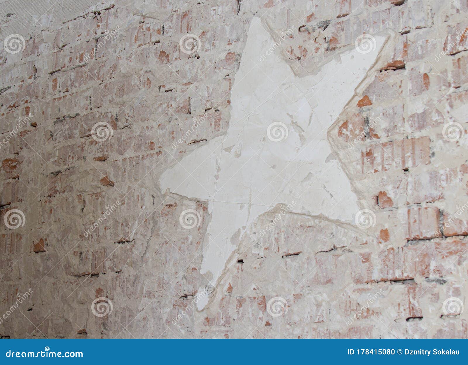 Brick Wall with Five-pointed Star Stucco Painted in White Stock Photo ...
