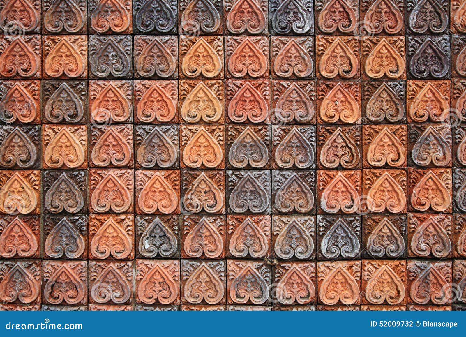 Brick Wall with Floral Leaf Carving Stock Photo - Image of aged ...