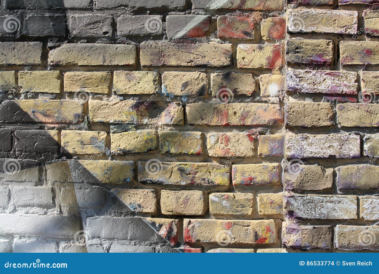 Brick wall with graffiti stock photo. Image of cement - 86533774