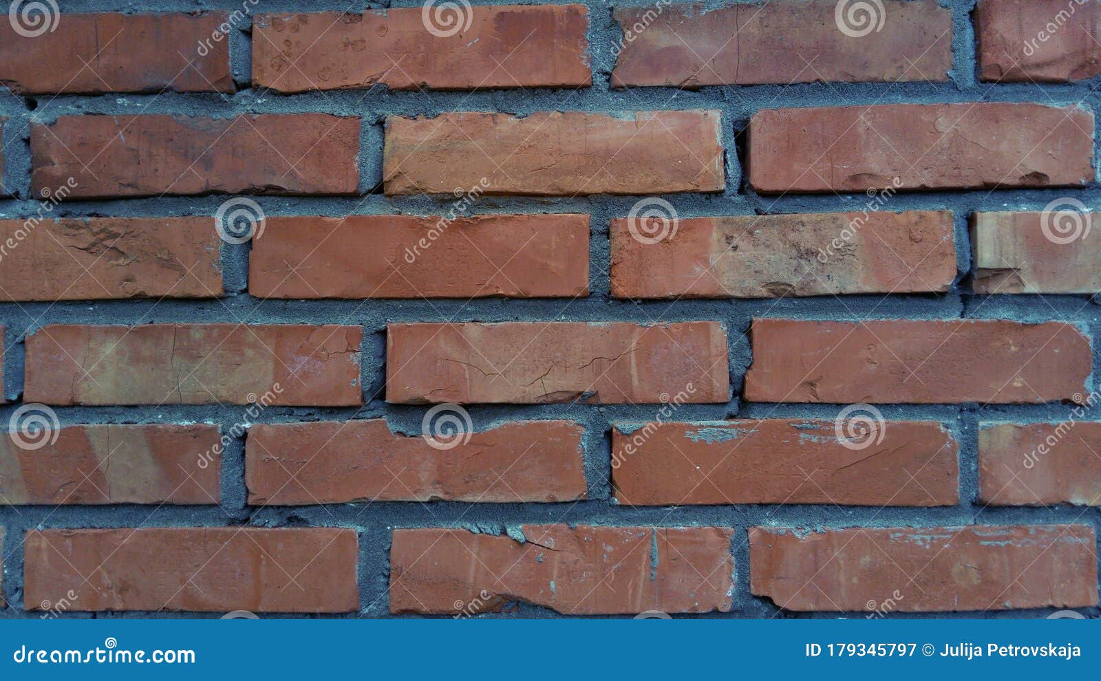 Brick Wall Made of Dark Red Bricks. Lightly Worn Surface. Neat Masonry ...