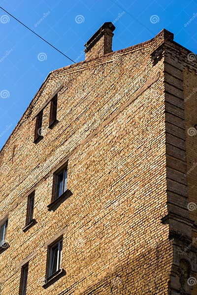 Brick Wall of Old Building with Windows Stock Photo - Image of frame ...