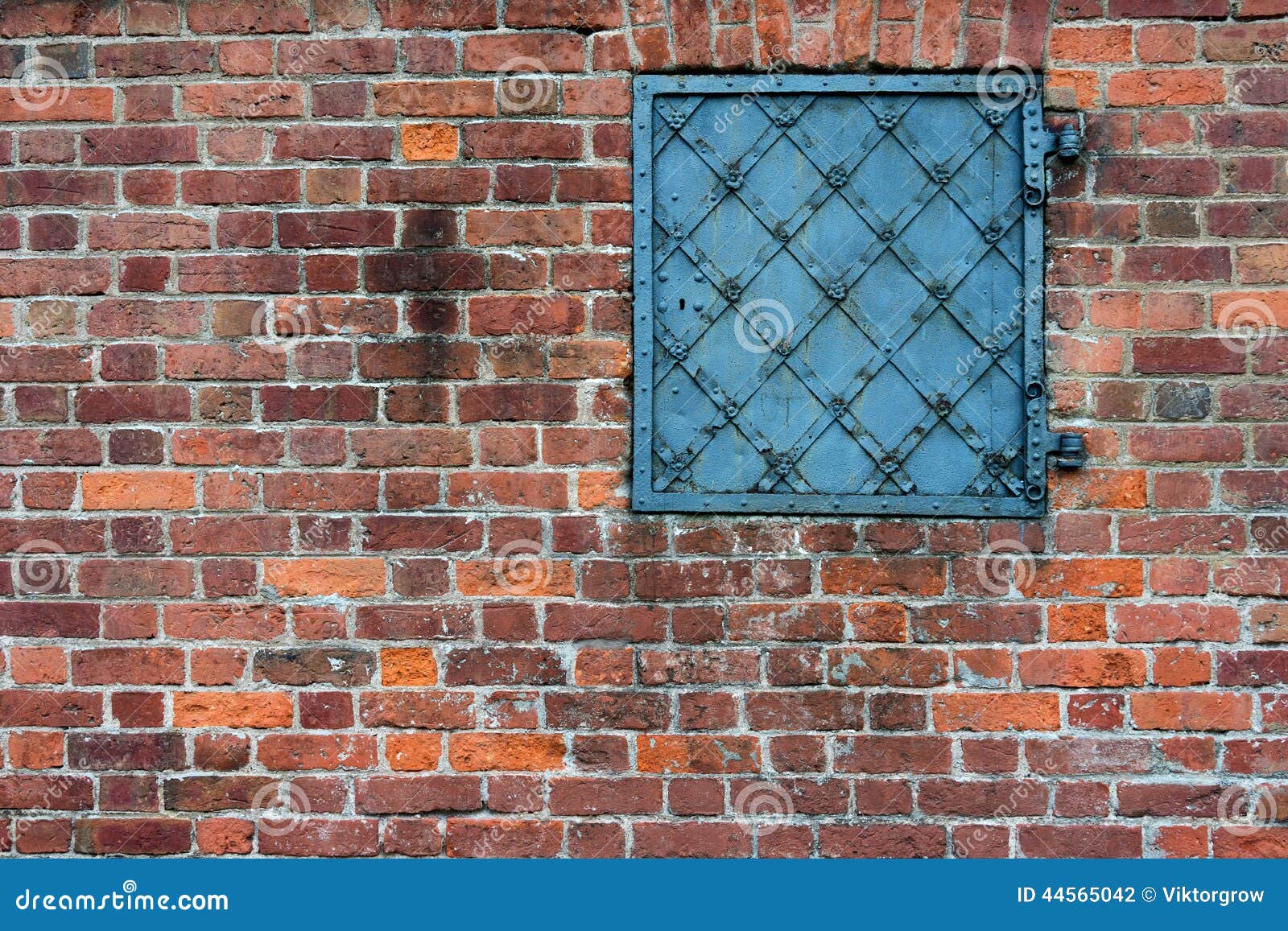 Brick Wall with an Old Metal Door Stock Photo - Image of decoration ...