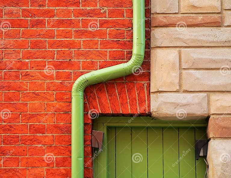 Brick Wall and Rain Gutter stock image. Image of pipe, city - 188401
