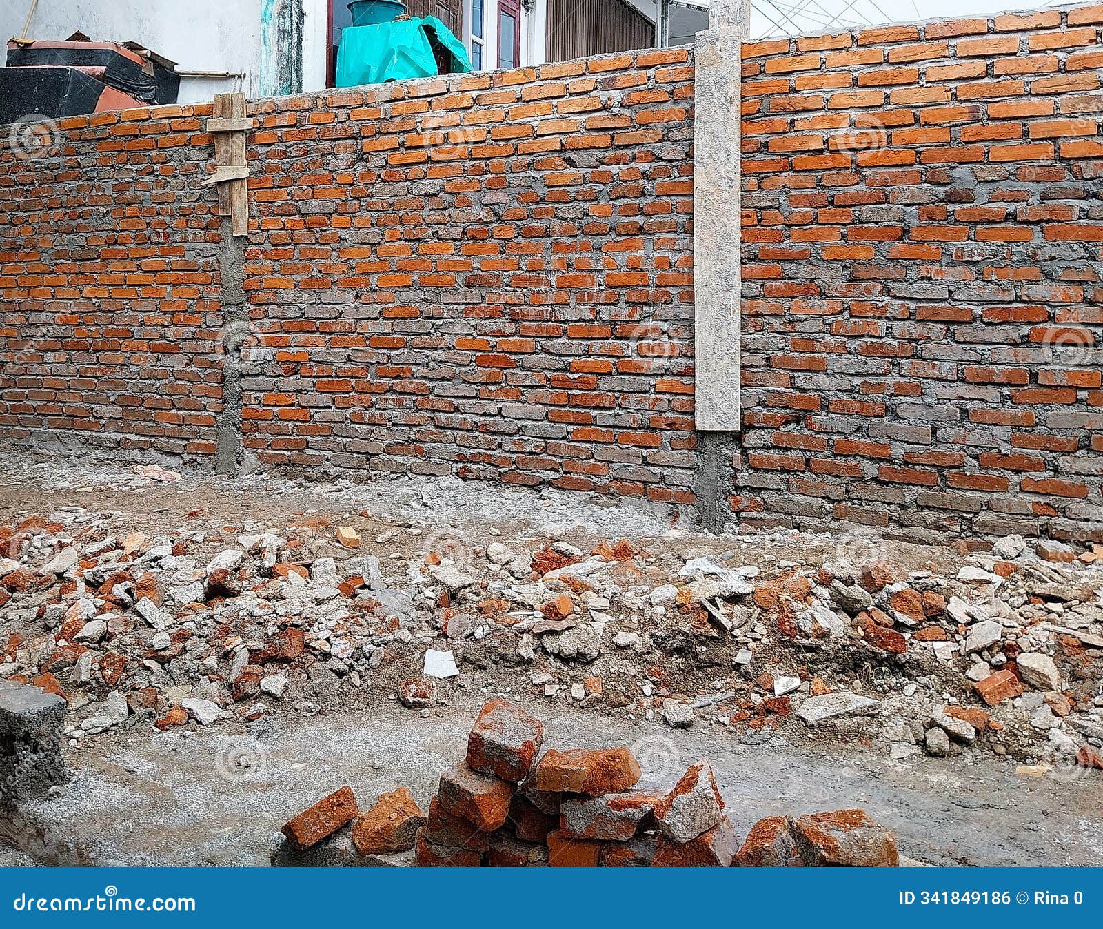 Brick Wall with Rubble in Front of it. Stock Photo - Image of ruins ...