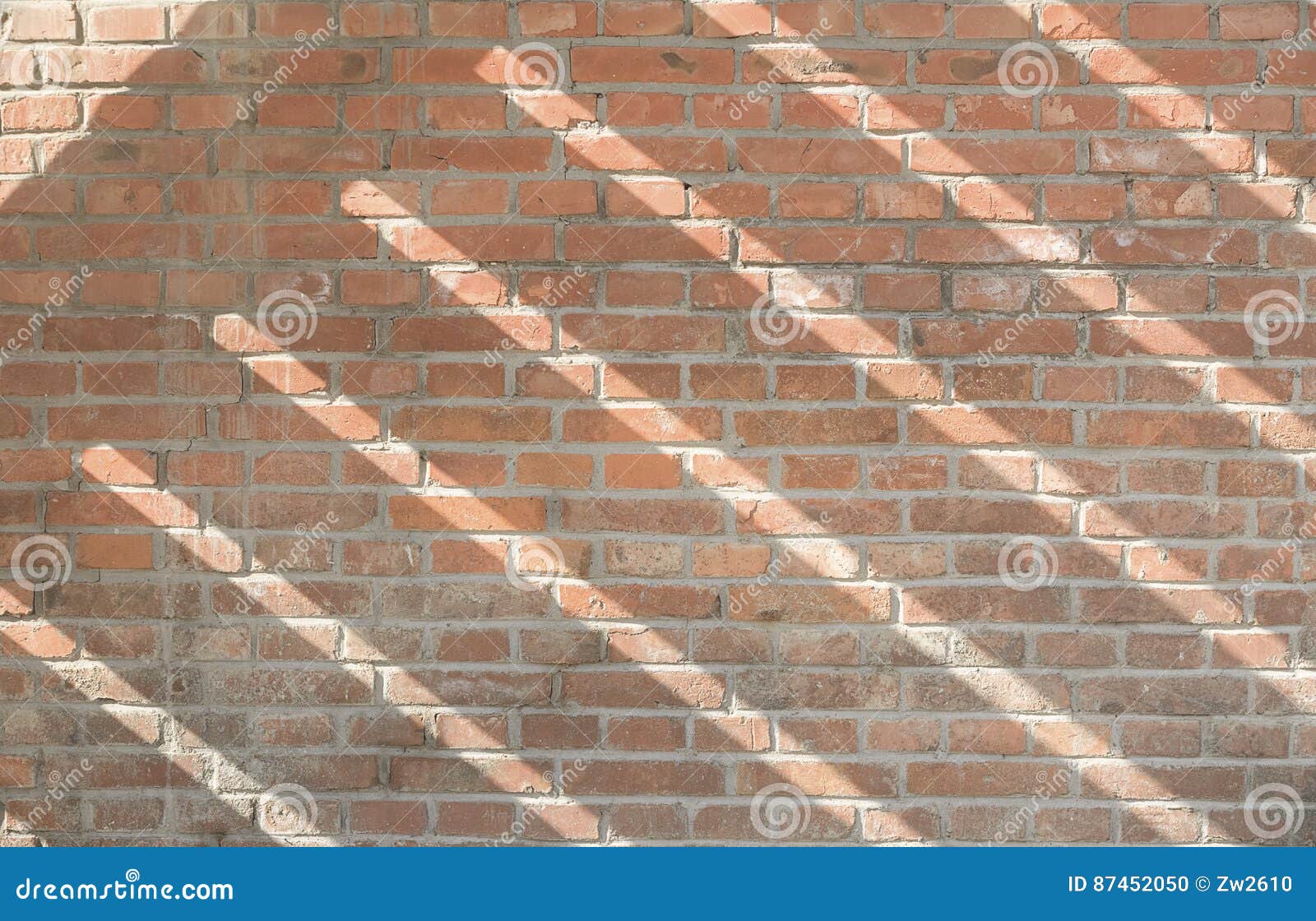 A brick wall in shadow stock photo. Image of bricks, texture - 87452050