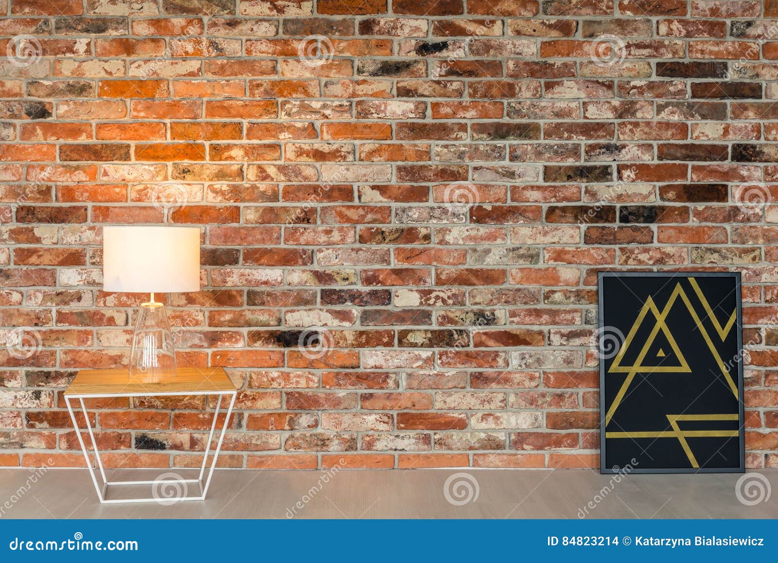 Brick wall and side table stock photo. Image of design - 84823214