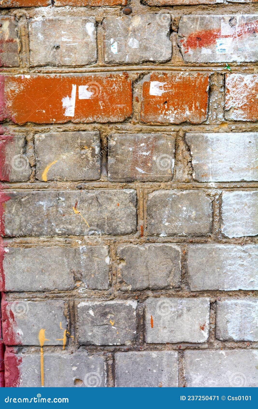 Brick Wall with Some Bricks Pristine and Others Marred, Smudged, or ...