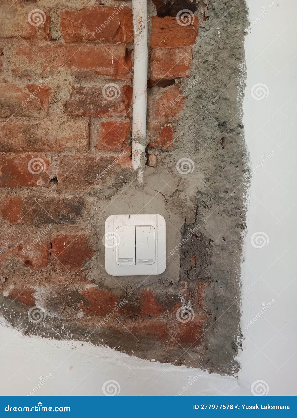 A Brick Wall with a Switch on it Stock Photo - Image of switch, rustic ...