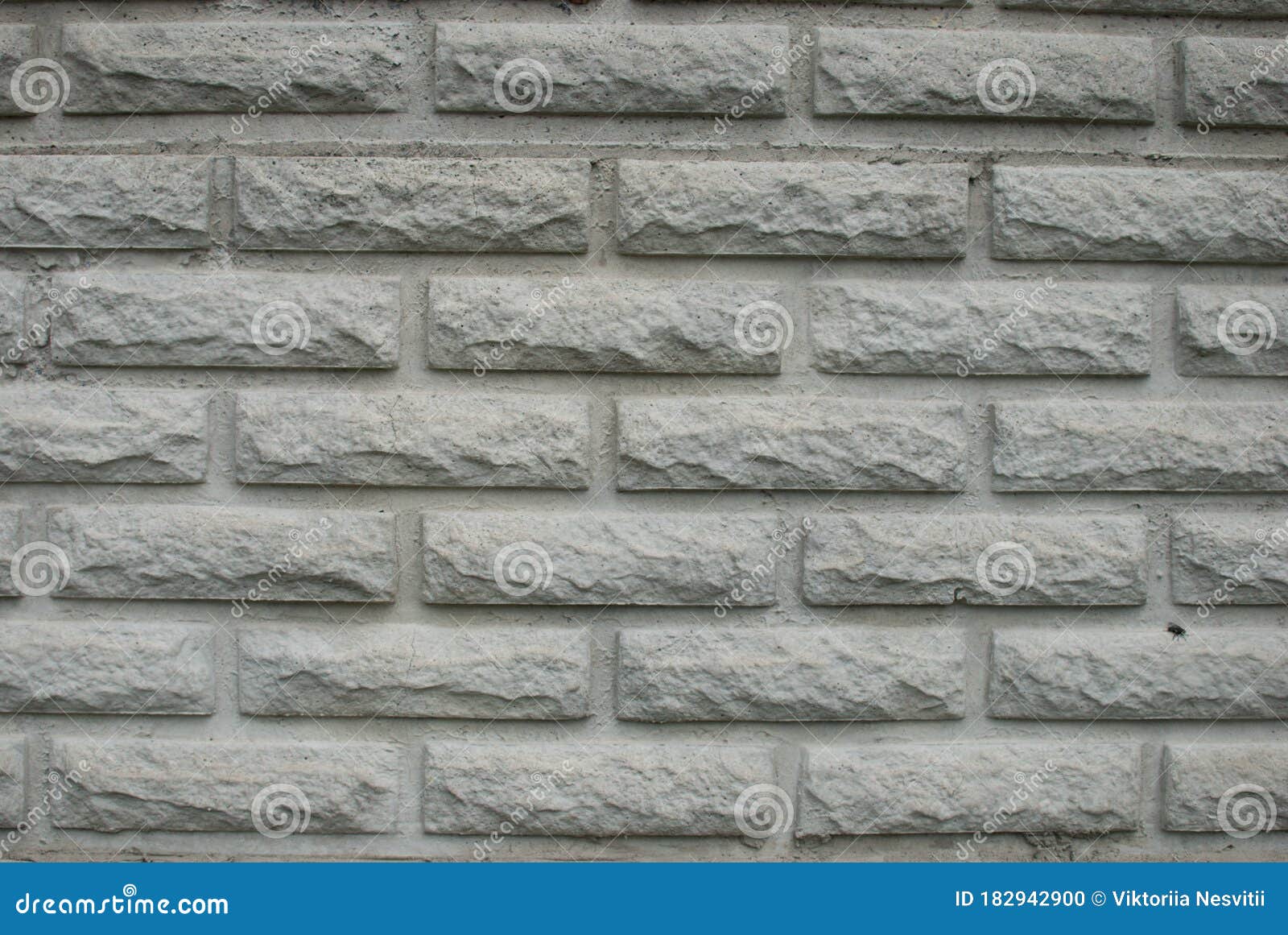 Brick Wall Texture. Gray, Convex Bricks of a Building Wall Stock Photo ...