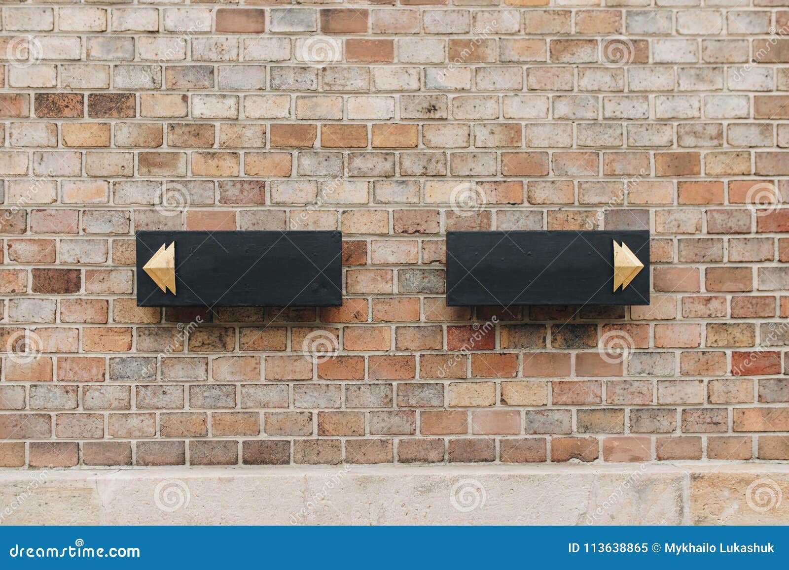 Brick Wall with Two Signboards with Direct Way Stock Image - Image of ...