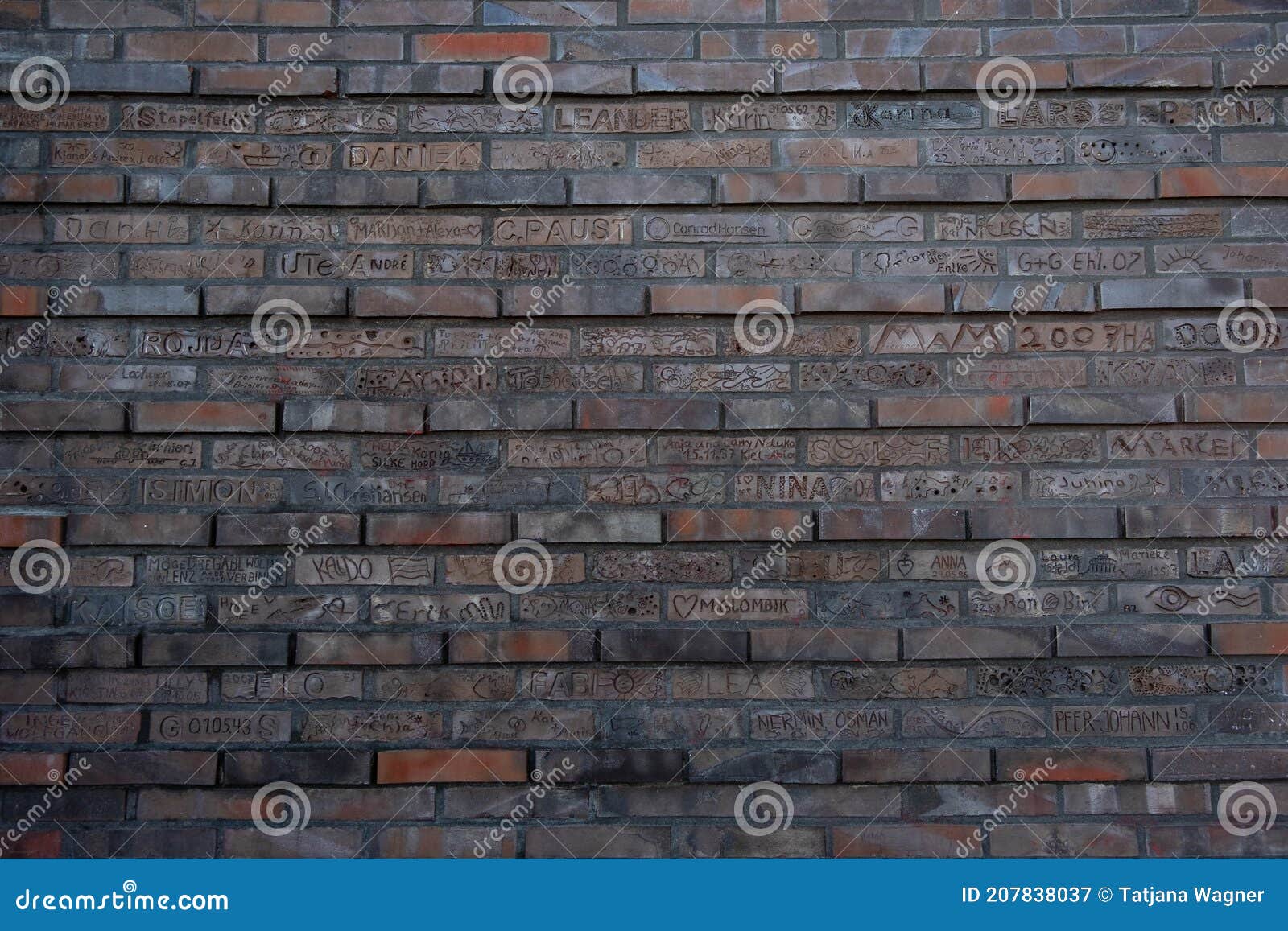 Brick Wall and Various Names Written on it Stock Image - Image of rough ...