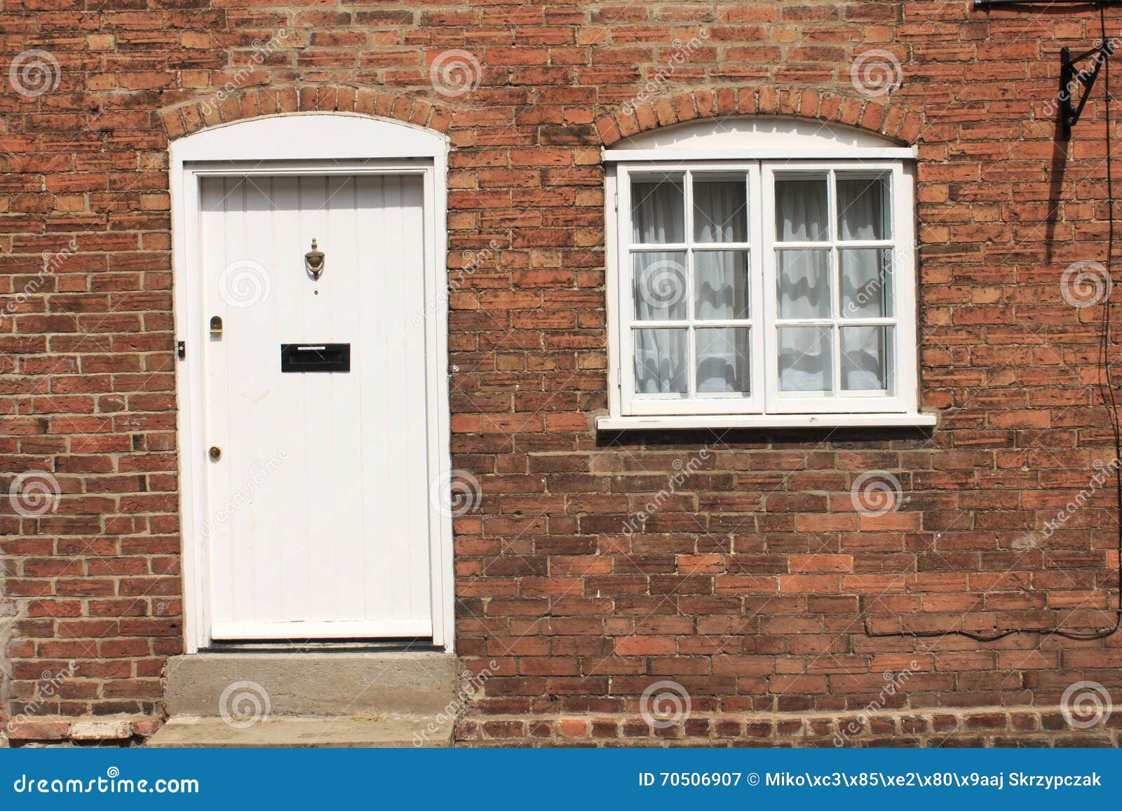 Brick Wall with White Door and Window Stock Image - Image of door ...
