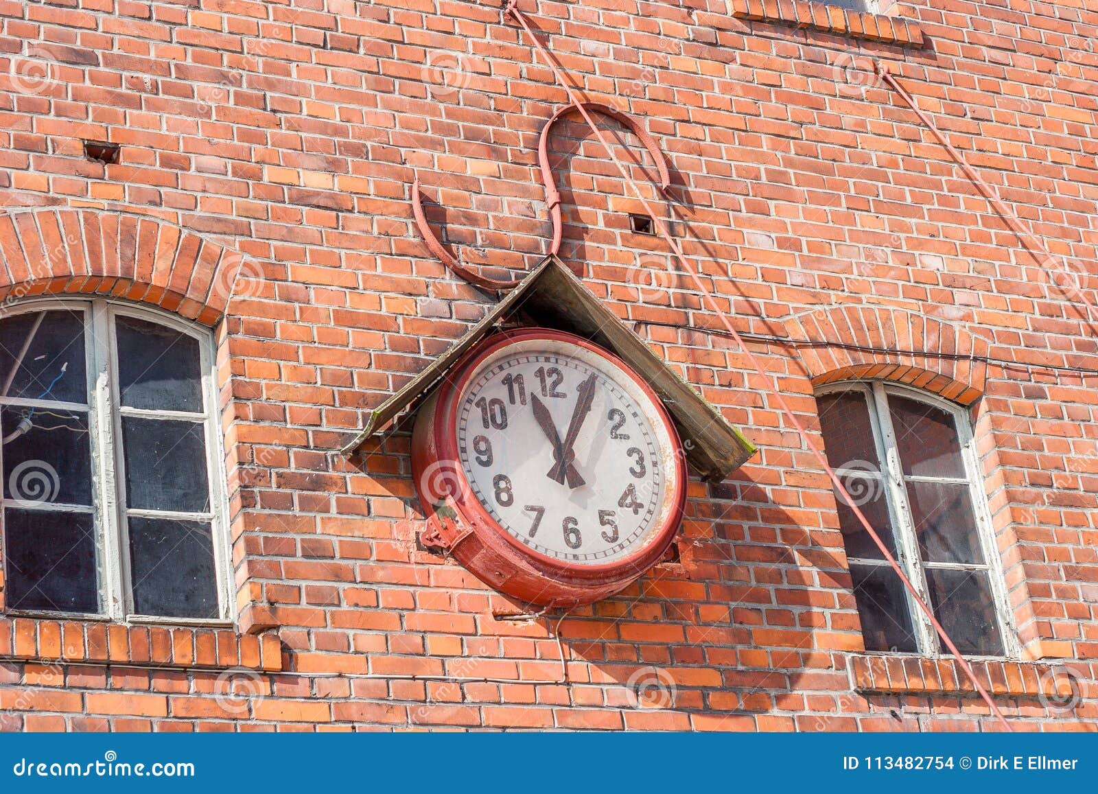 Brick Wall with Window and Wall Clock Stock Photo - Image of building ...