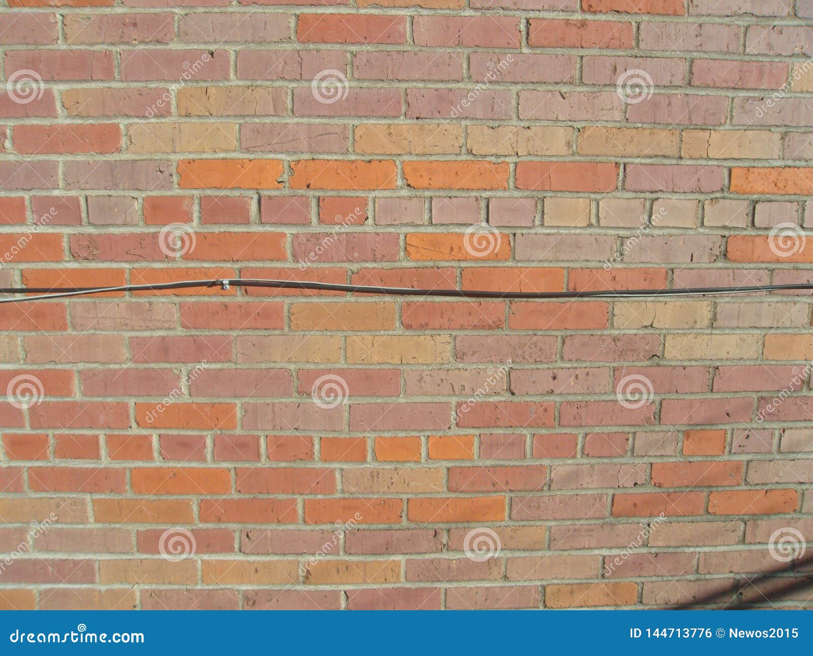 Brick wall with wires 5 stock photo. Image of mortar - 144713776