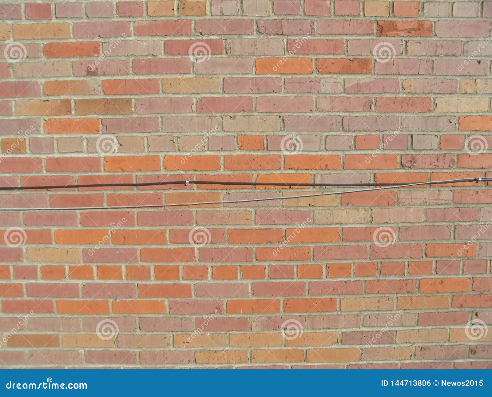 Brick wall with wires 1 stock photo. Image of mortar - 144713806