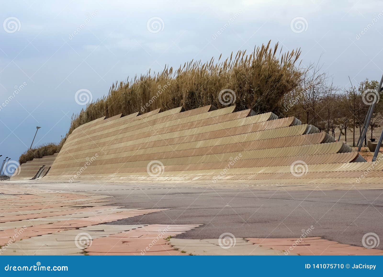 Brick Yellow Wave Structure by the Sea in Barcelona, Spain Stock Photo ...