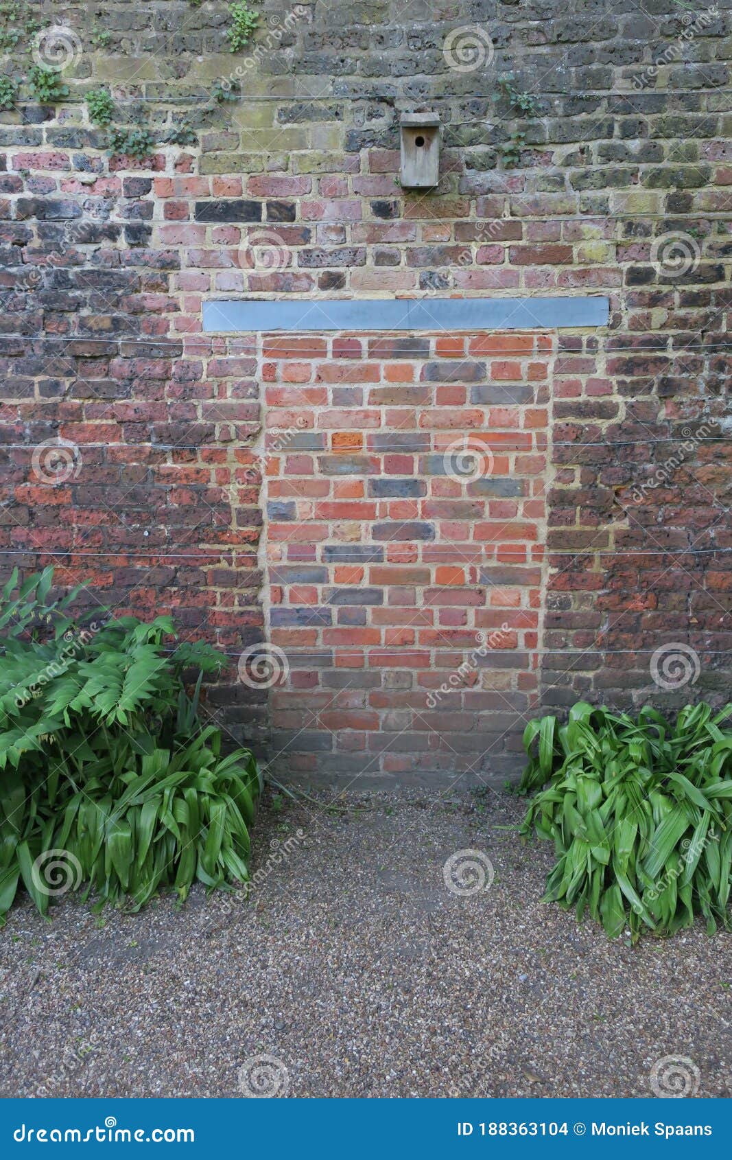 Bricked Up Wall in a Red Bricked Wall in a Garden Stock Photo - Image ...