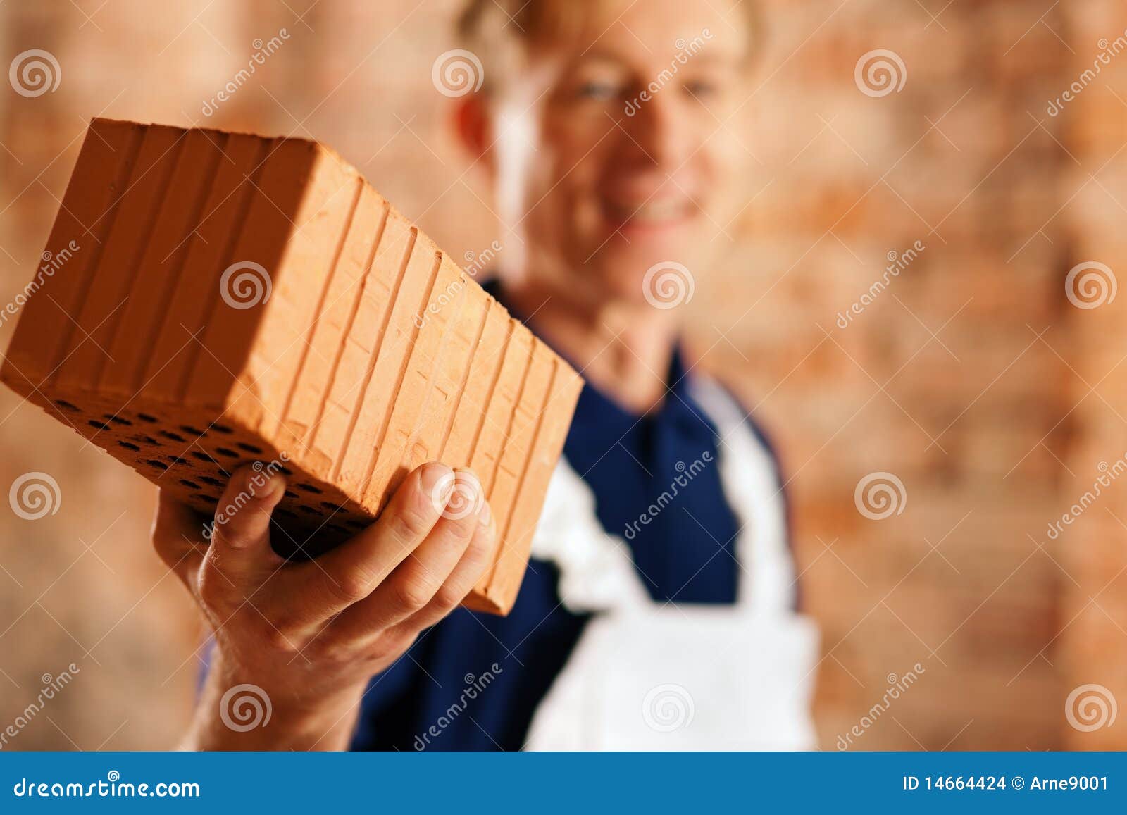Bricklayer with Brick on Construction Site Stock Photo - Image of ...