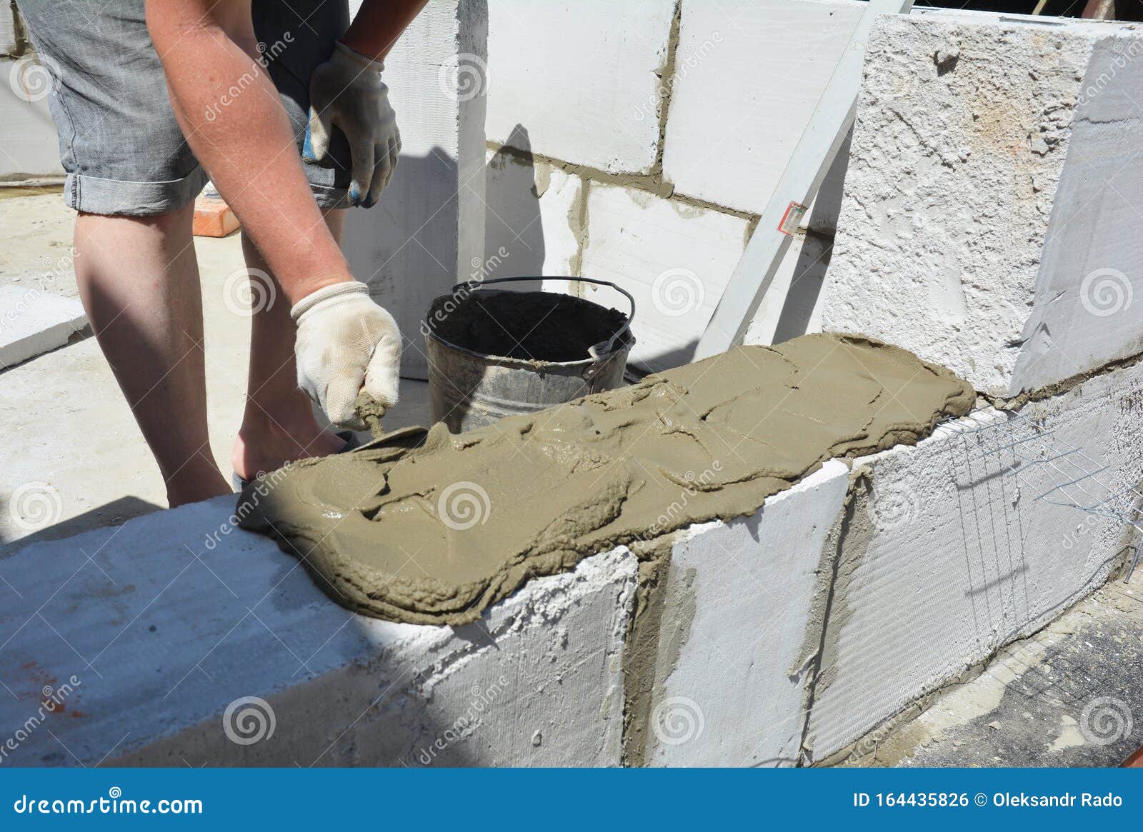 Bricklayer Builder Laying Autoclaved Aerated Concrete Blocks, Aac ... Bricklayer Builder Laying Autoclaved Aerated Concrete Blocks, Aac ...