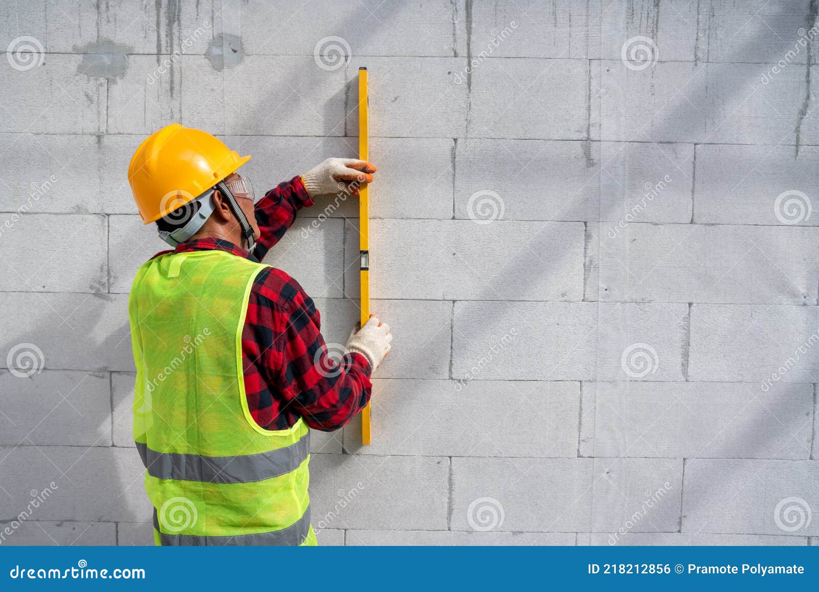 Bricklayer Builder Using the Water Level, Check the Inclination of ...