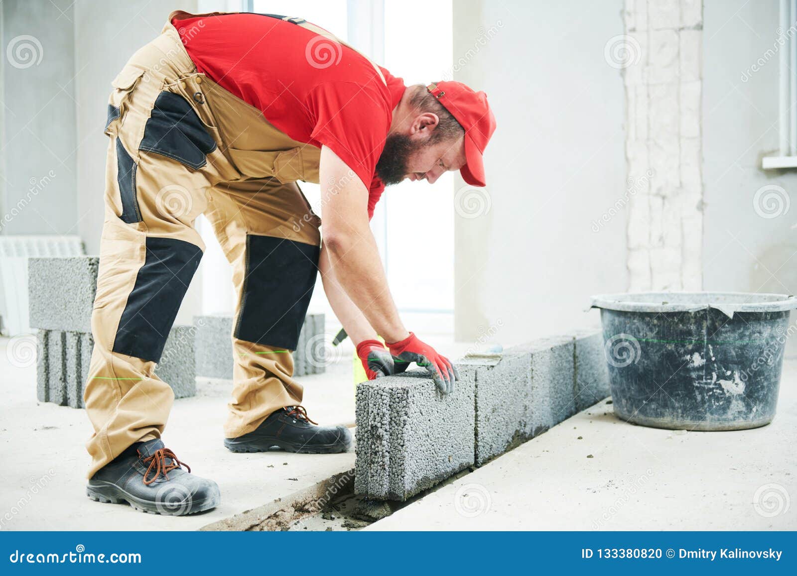 Bricklayer Builder Working With Ceramsite Concrete Blocks. Walling ...