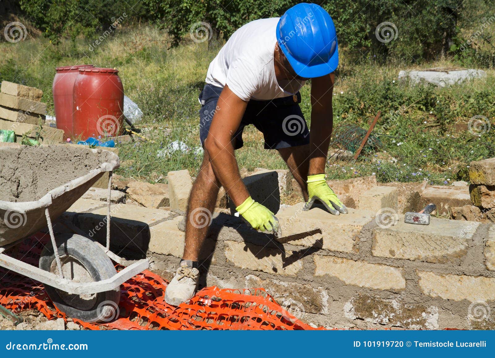 Bricklayer at work stock photo. Image of masonry, bricks - 101919720