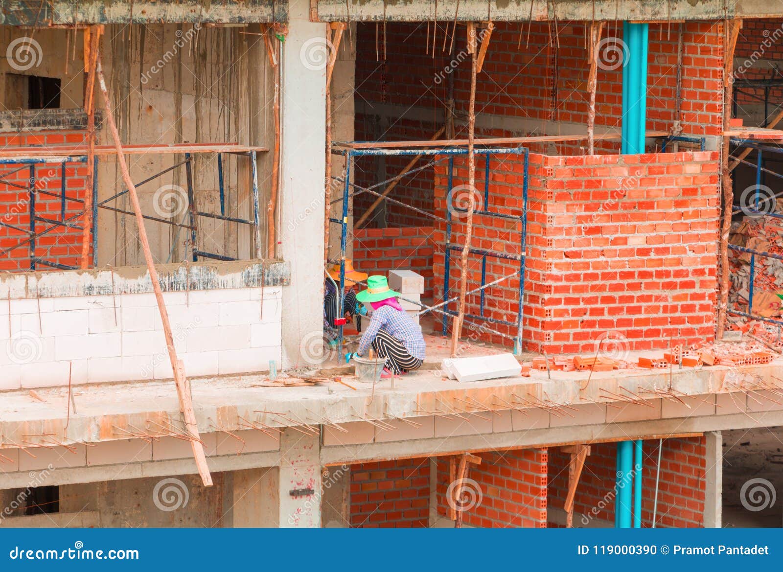 Bricklayer Female Worker Work Industrial Installing Wall Bricks in ...
