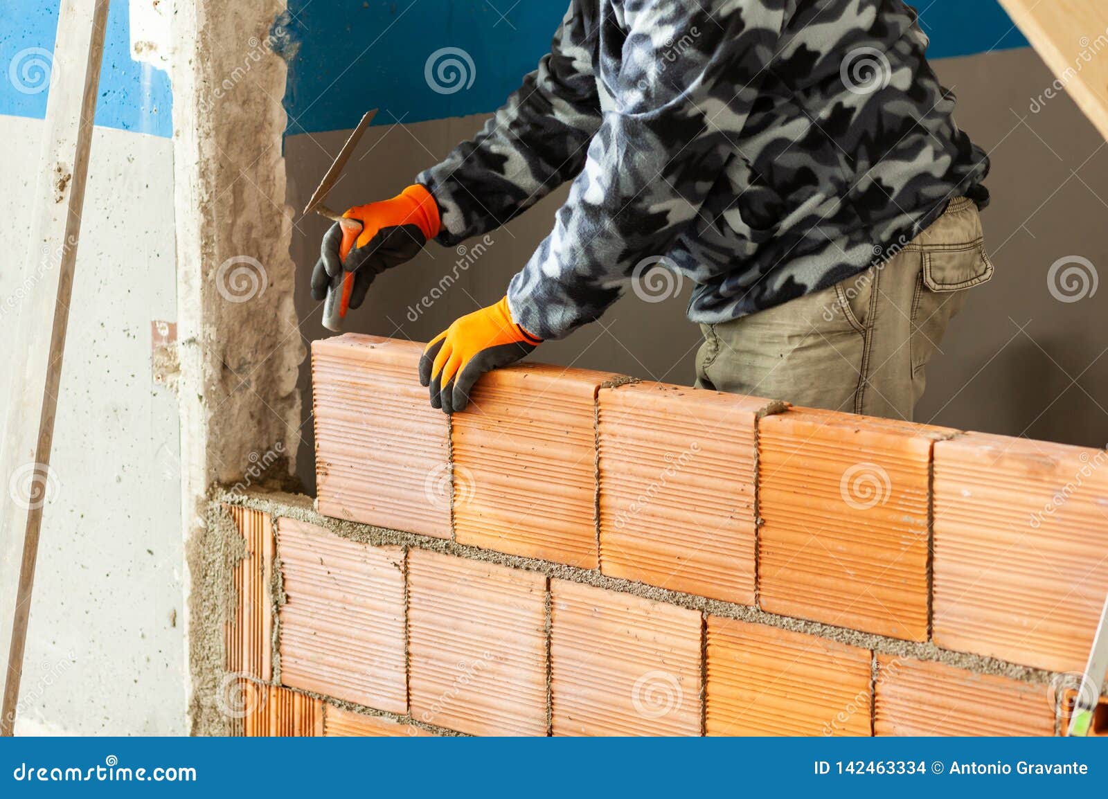 Bricklayer Industrial Worker Installing Old Bricks. Masonry On Exterior ...