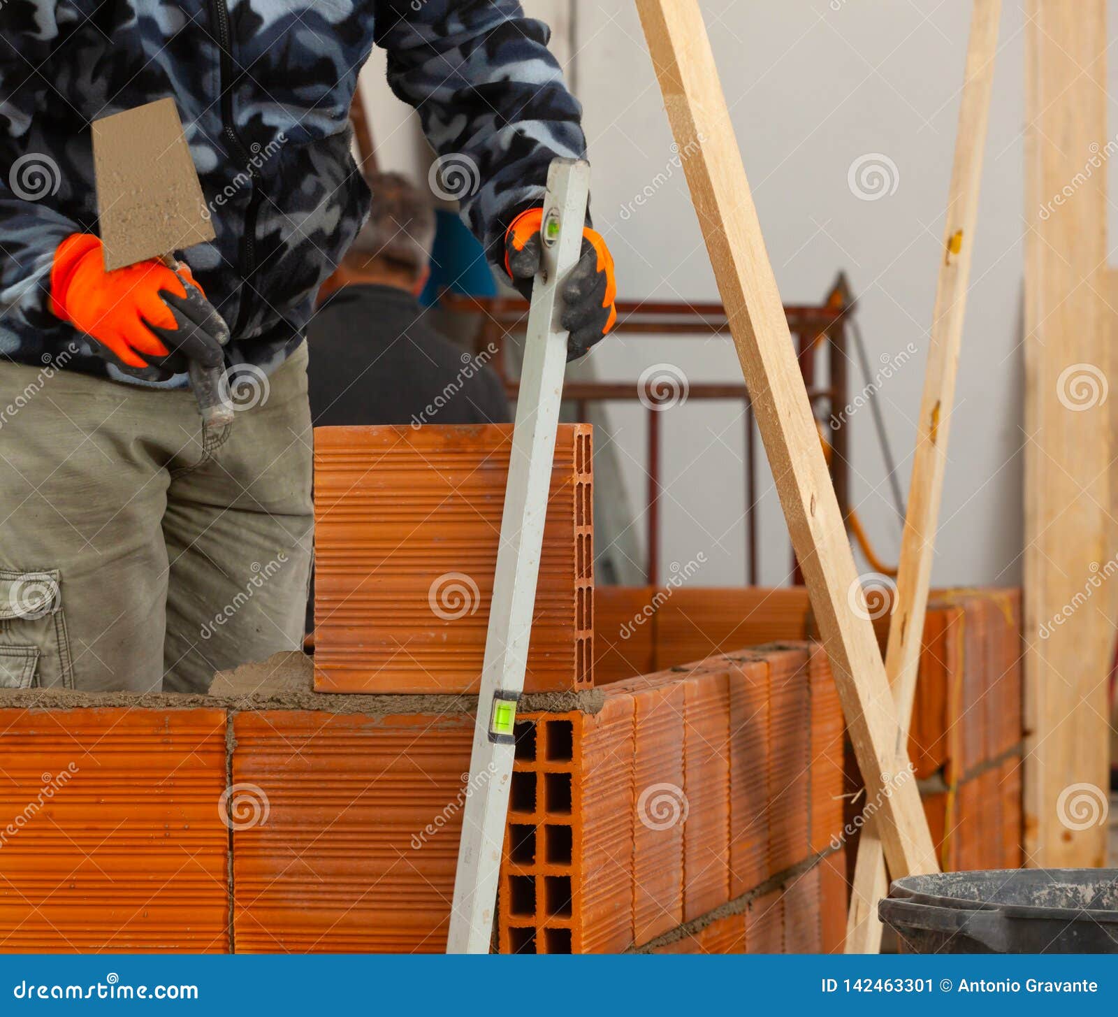 Bricklayer Industrial Worker Installing Old Bricks. Masonry On Exterior ...