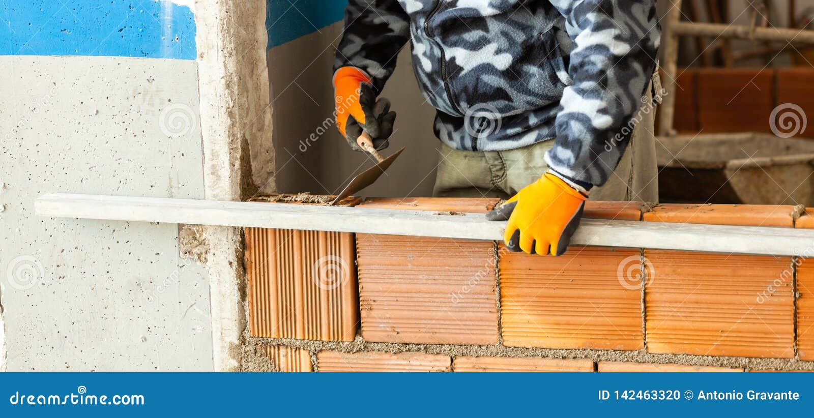 Bricklayer Installing Brick Masonry on Interior Wall Stock Photo ...