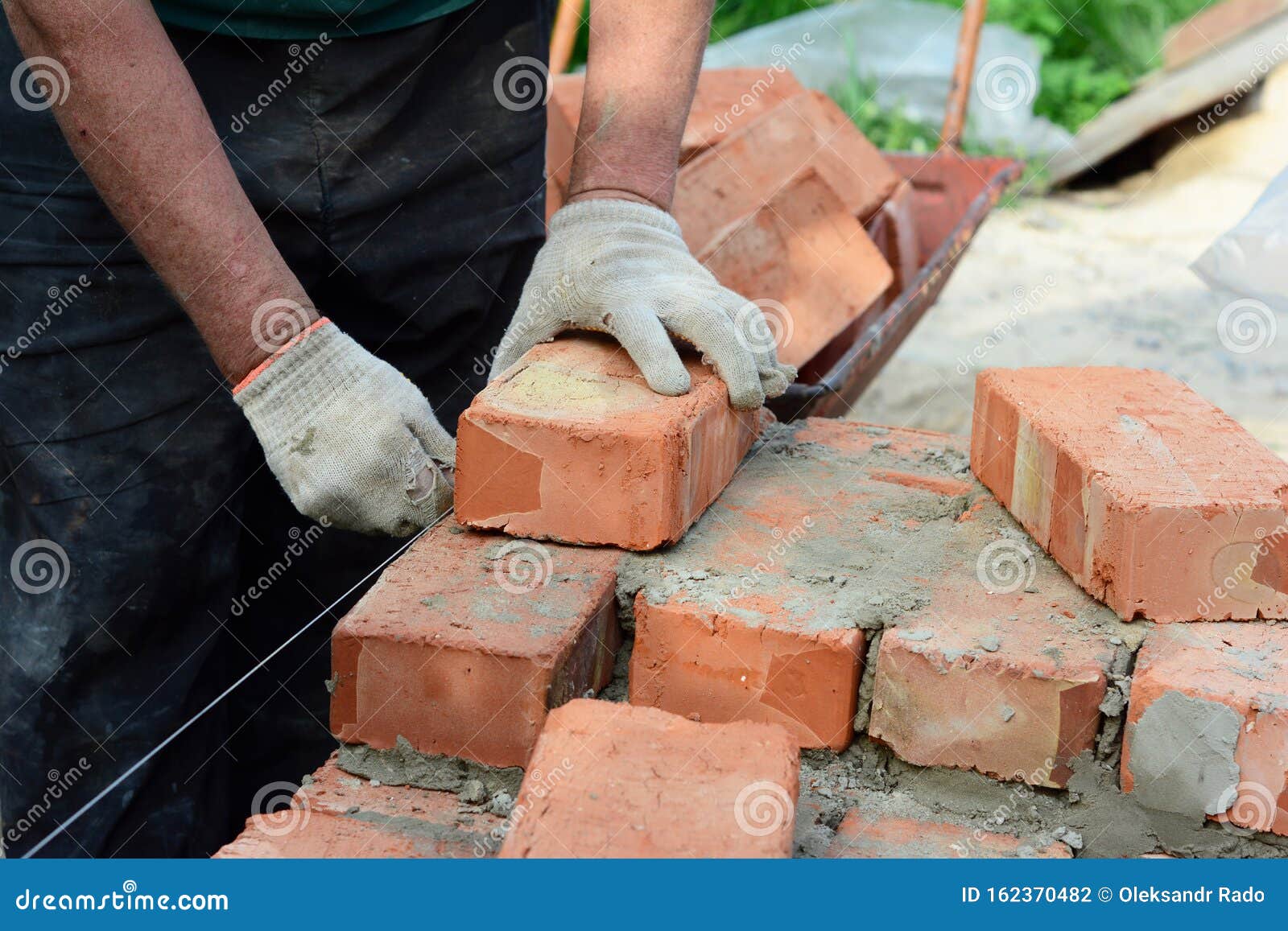 Bricklayer Laying Bricks. Bricklaying, Masonry, Brickwork on New House ...