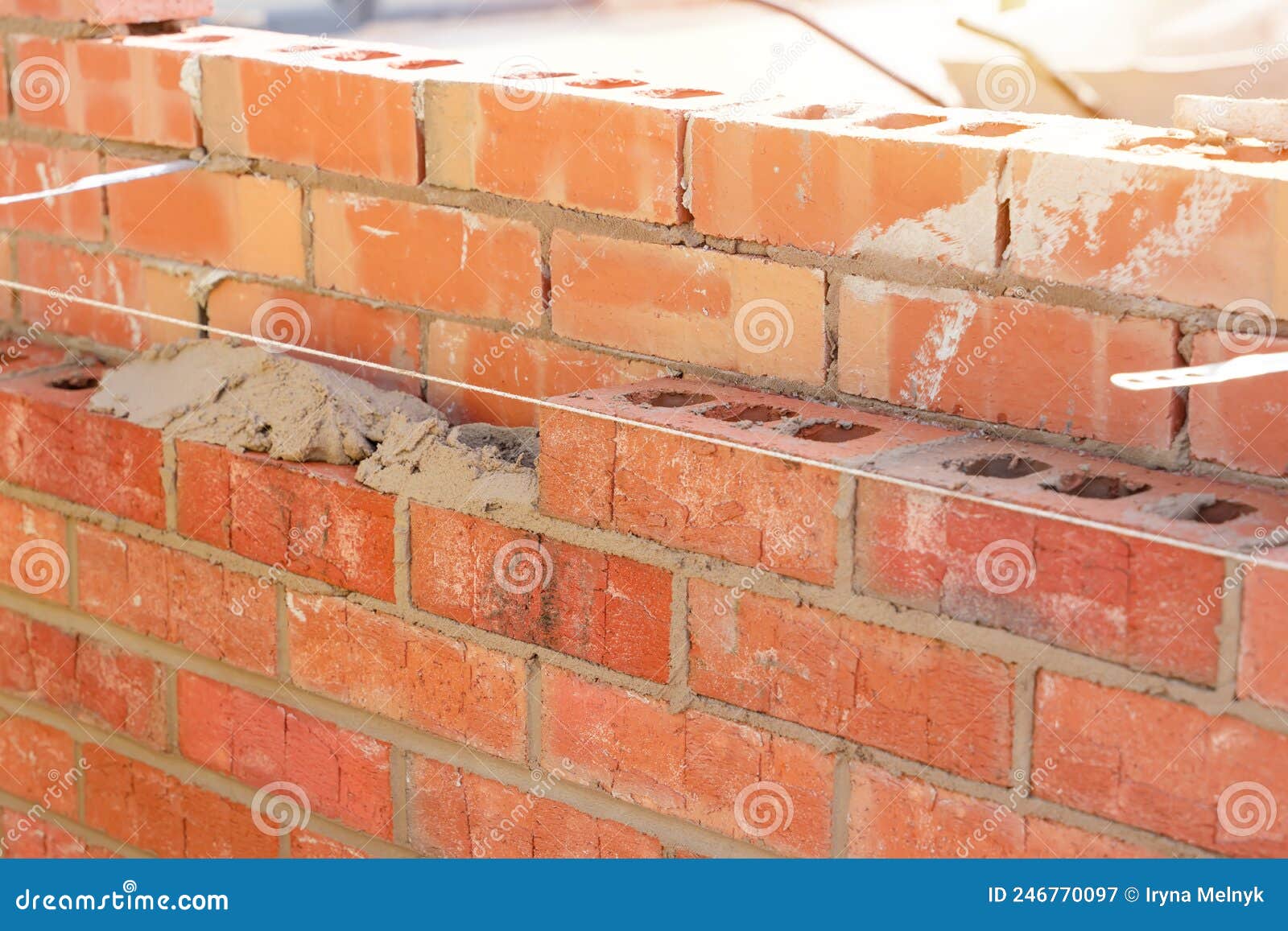 Bricklayer Laying Bricks on Mortar on New Residential House ...