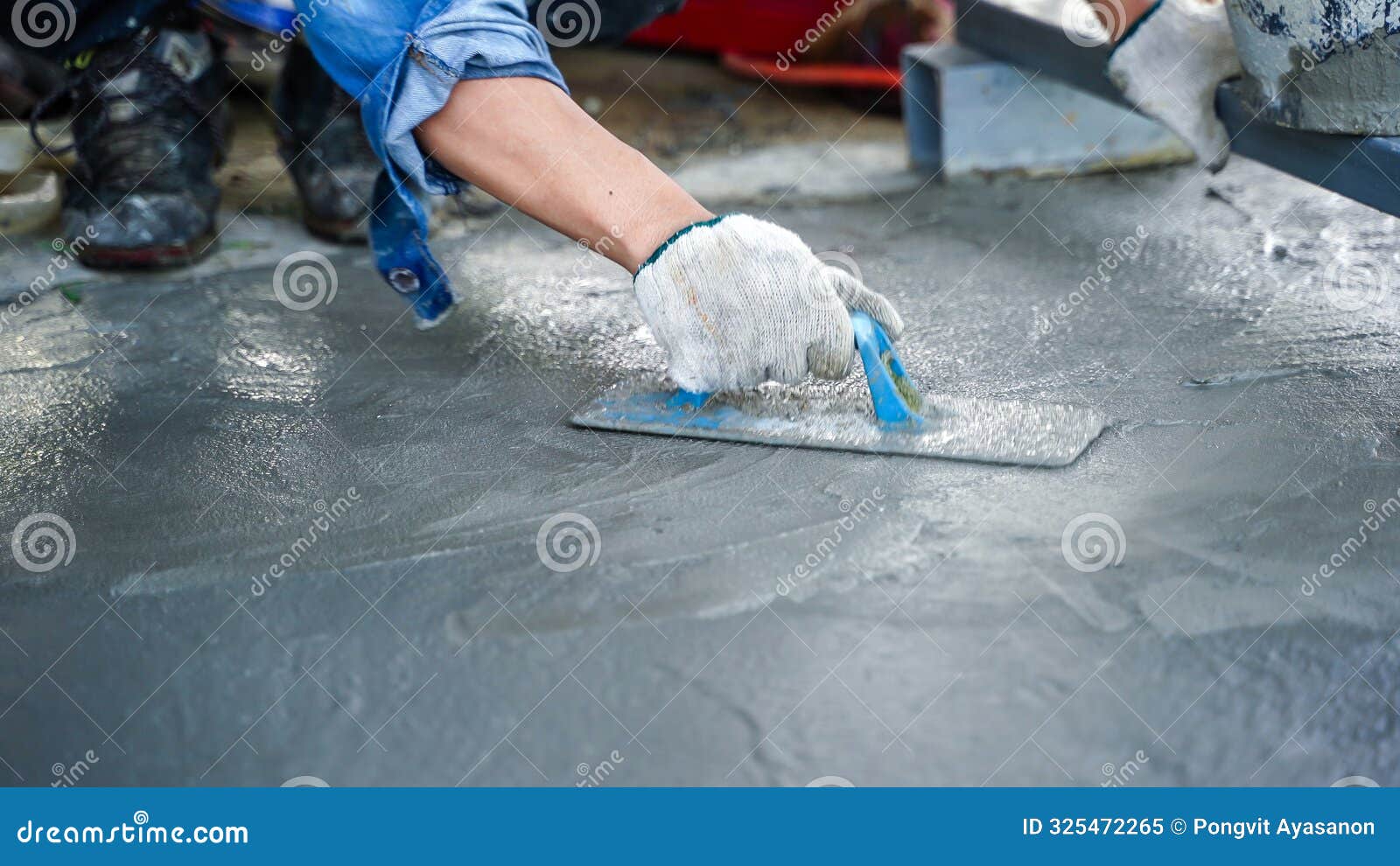 Bricklayer Laying Concrete To Create a Cement Floor Inside the House ...