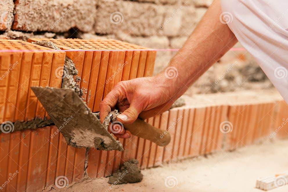 Bricklayer Making Wall with Brick and Grout Stock Image - Image of ...