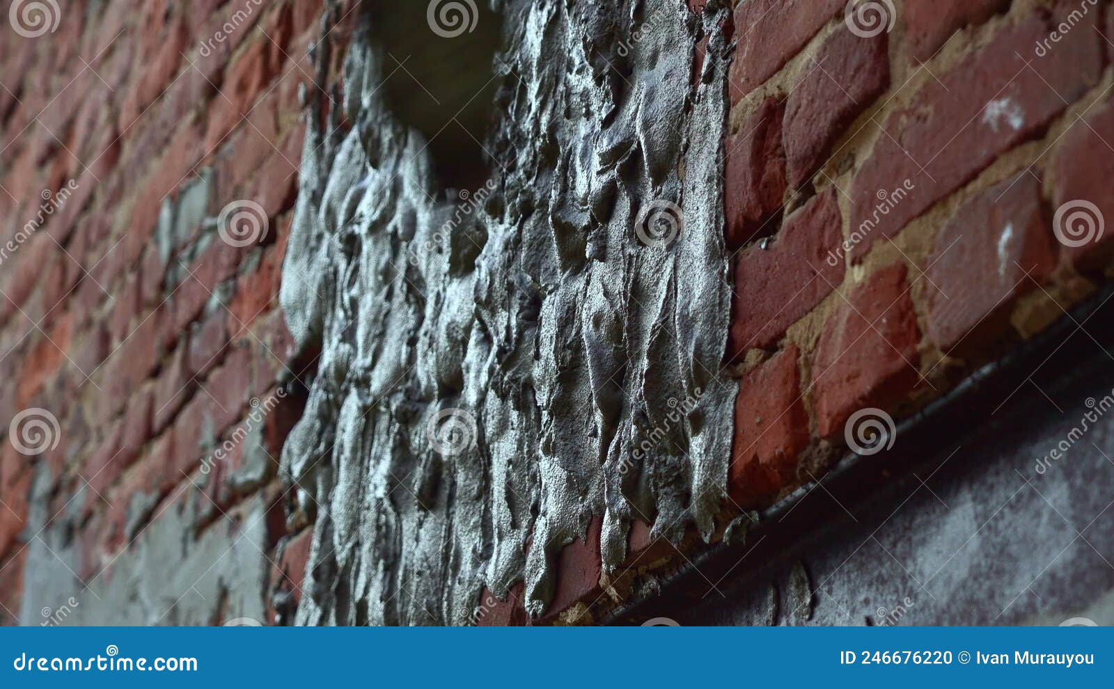A Bricklayer Puts Plaster on a Brick Wall. Plastering Cement at Wall ...