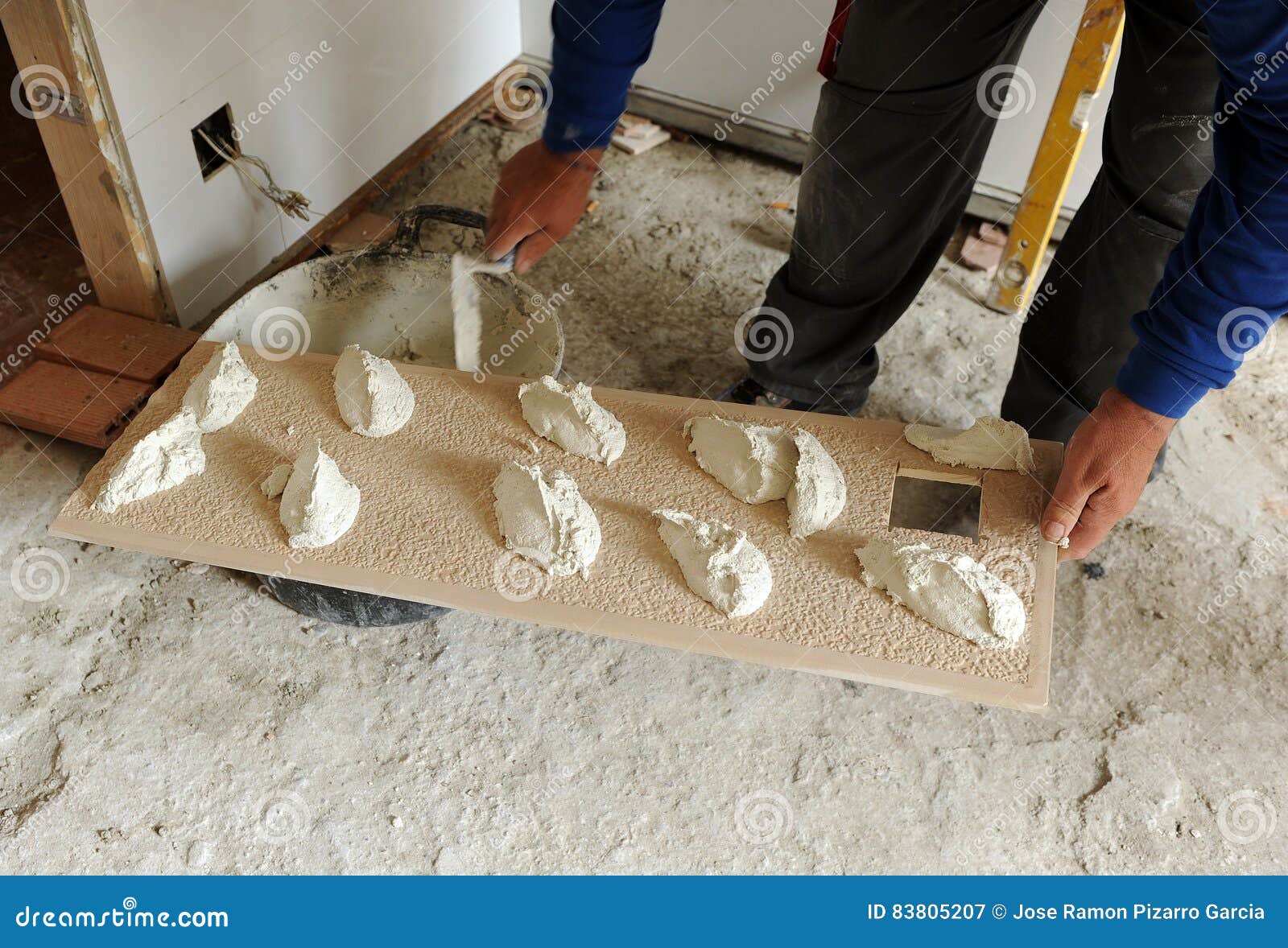 Bricklayer Putting Cement Mortar on Tiles Stock Image - Image of ...