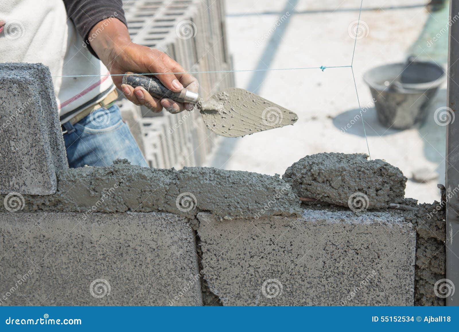 Bricklayer Putting Down Another Row of Bricks in Site Stock Photo ...