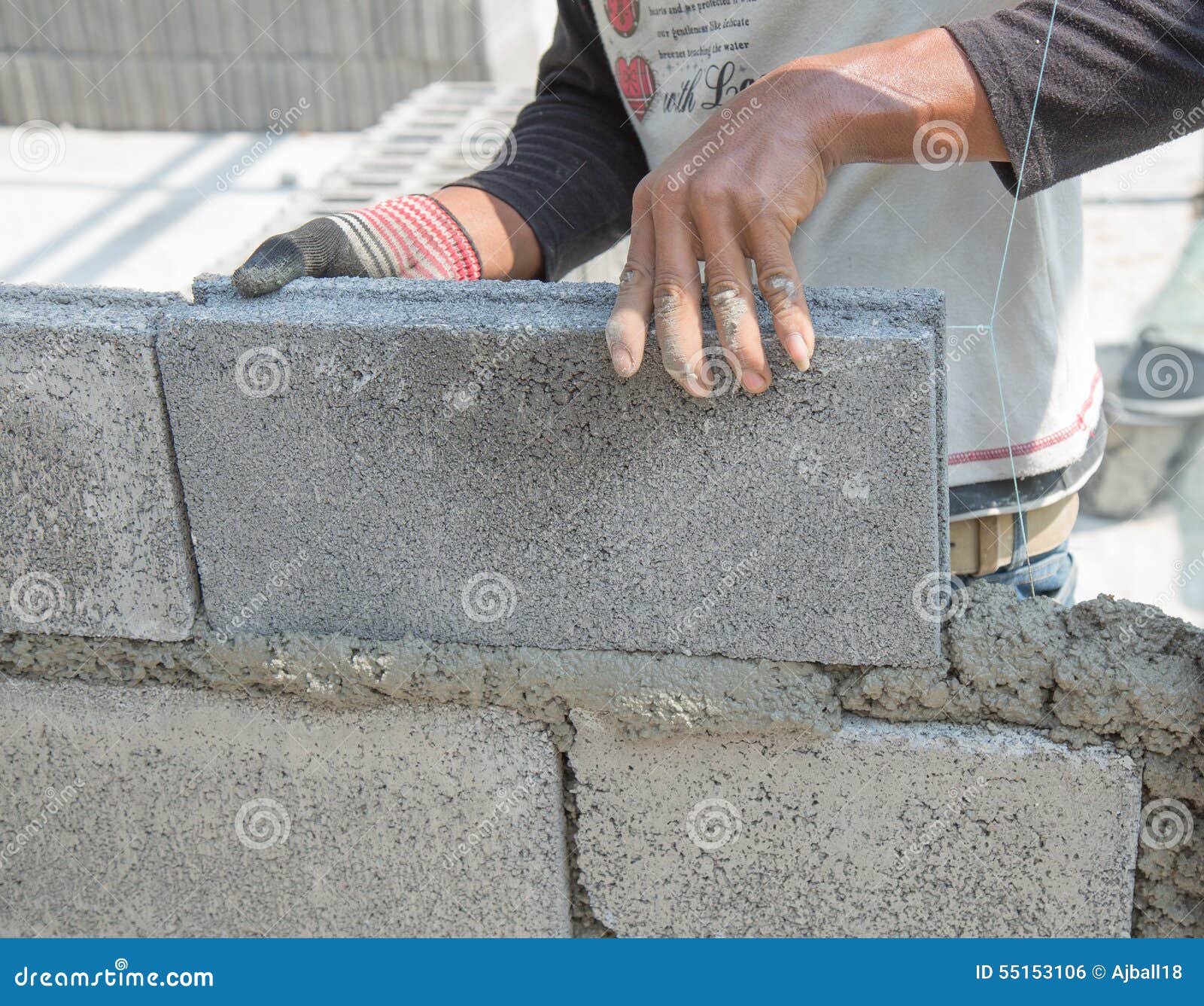 Bricklayer Putting Down Another Row of Bricks in Site Stock Photo ...
