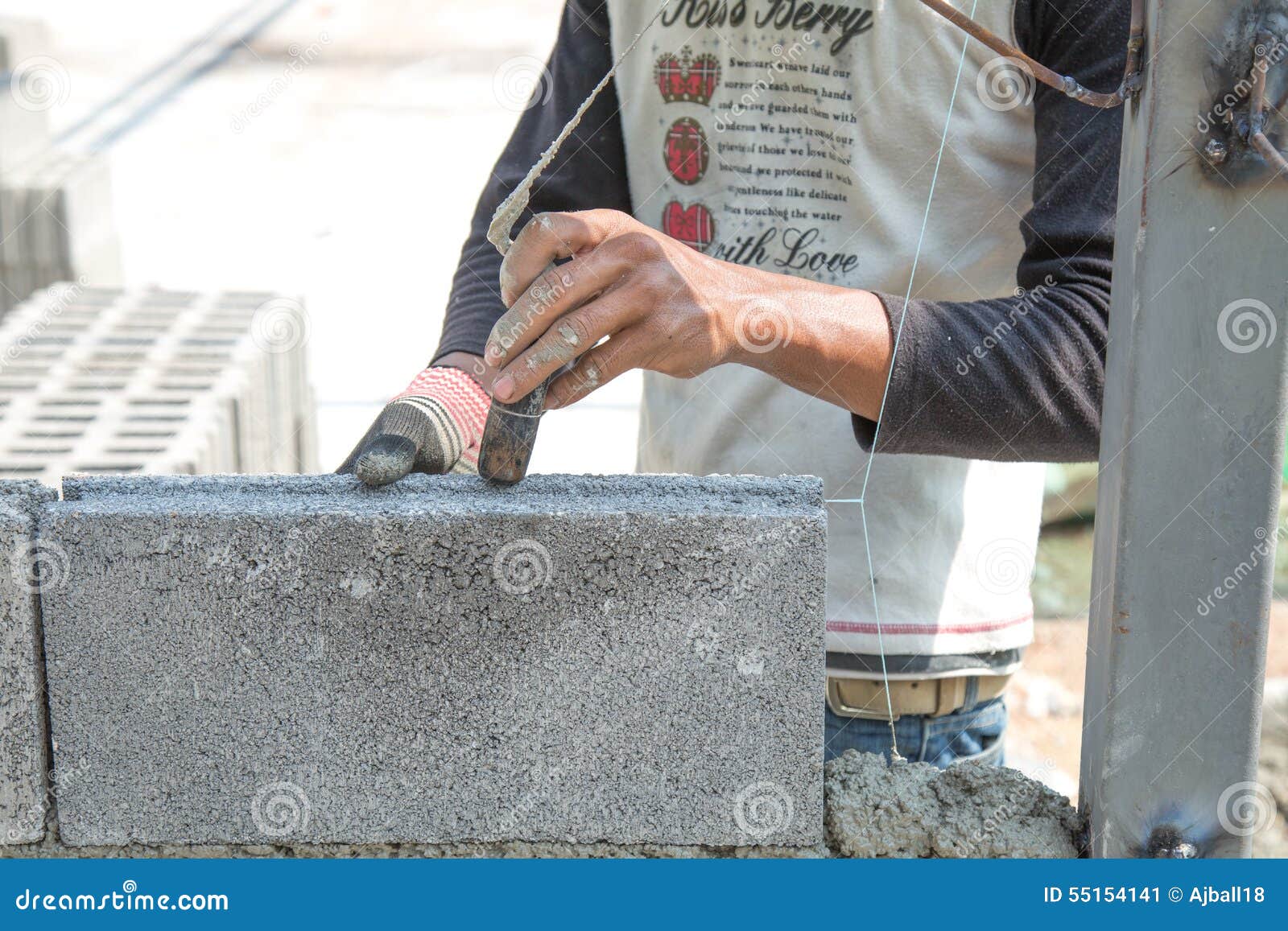 Bricklayer Putting Down Another Row of Bricks in Site Stock Image ...