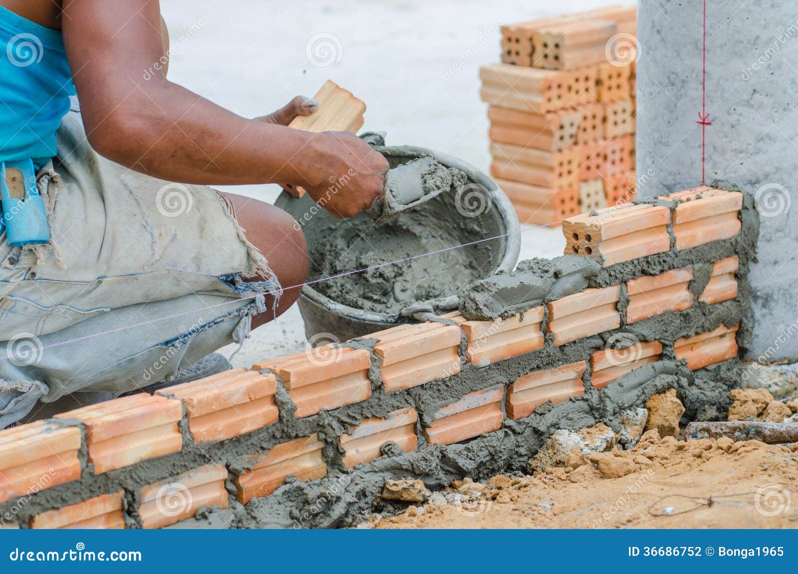 Bricklayer in site stock photo. Image of installing, business - 36686752
