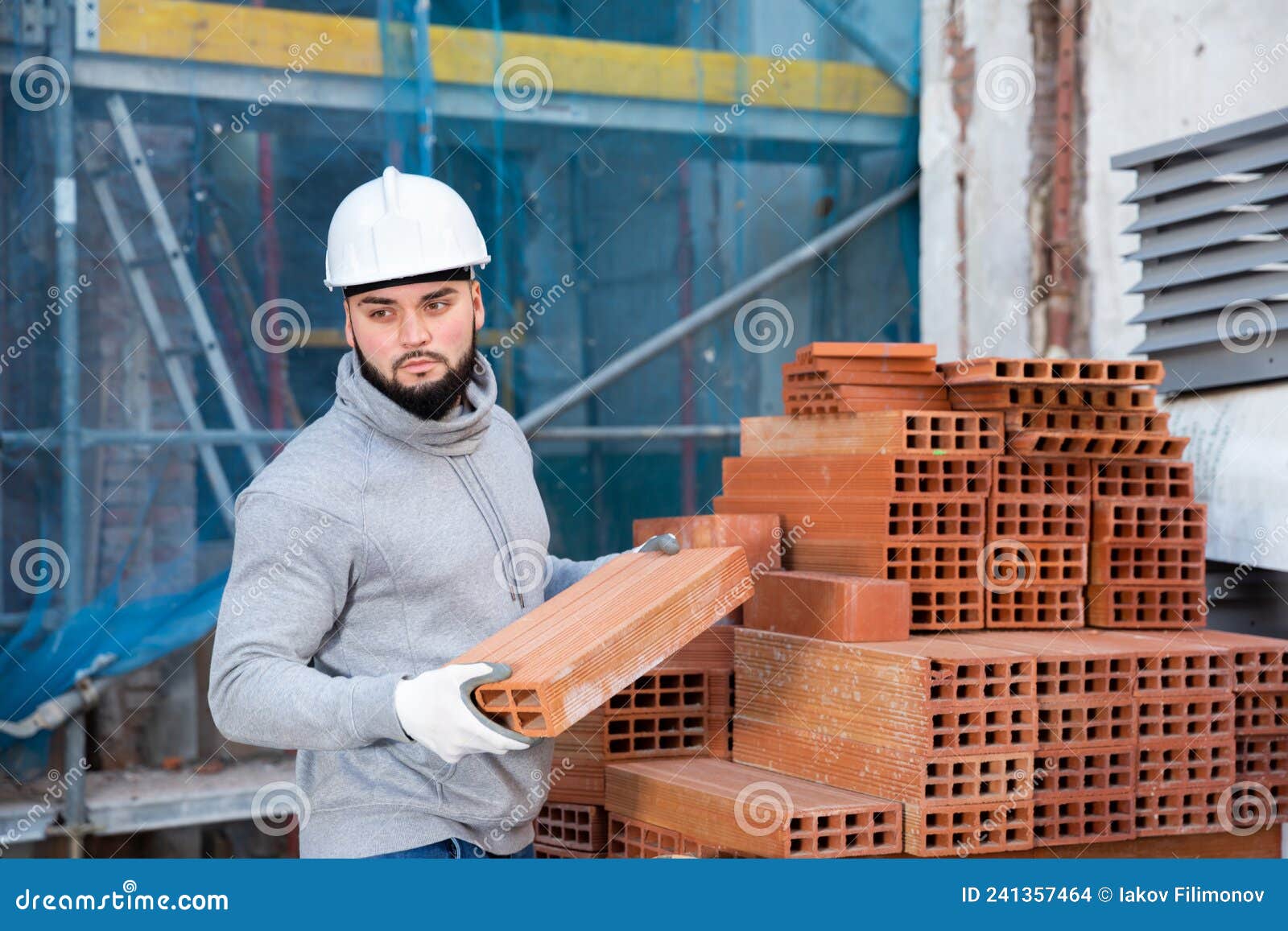 Bricklayer Taking Red Bricks from Stack Stock Photo - Image of handyman ...