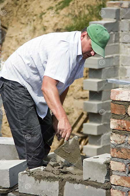Bricklayer at work stock image. Image of careful, house - 5465127