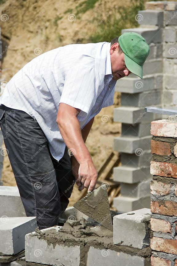 Bricklayer at work stock image. Image of careful, house - 5465127